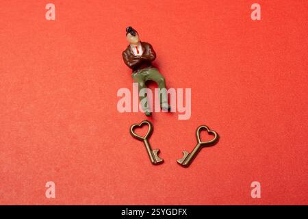 Pair of keys with heart shape icon as love icon and romance concept ...