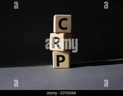 CRP - C-Reactive Protein Test symbol. Wooden cubes with word CRP ...