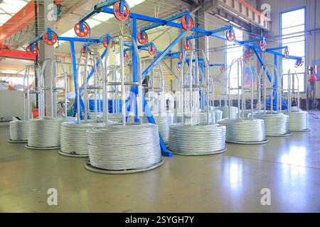 Fine wire mesh in the production workshop, modern industry Stock Photo ...