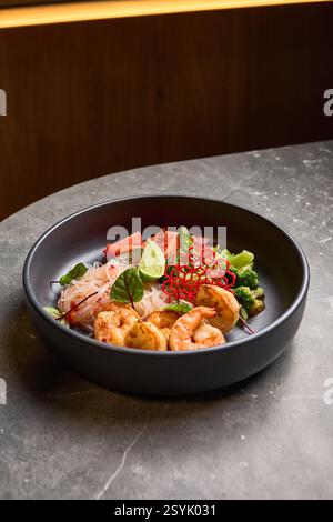 Asian salad with rice noodles, shrimp and vegetables, top view Stock ...