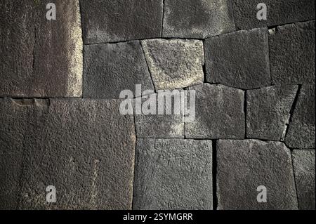 The imposing stone walls of the Imperial Palace in Tokyo stand as ...