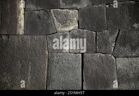 The imposing stone walls of the Imperial Palace in Tokyo stand as ...