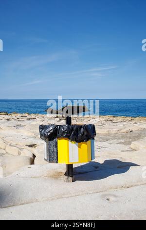 Garbage sorting can on Fond Ghadir beach on Malta Stock Photo - Alamy