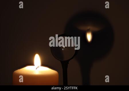 Still life: Experiment with convex lens and candle. Close-up with great ...