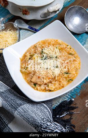 Tomato soup with rice decorated with parsley Stock Photo - Alamy