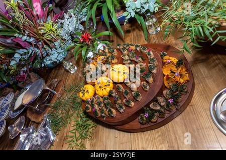 Sophisticated table of assorted brazilian foods Stock Photo - Alamy