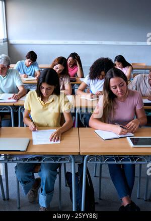 A diverse group of university students and their professor conduct a ...