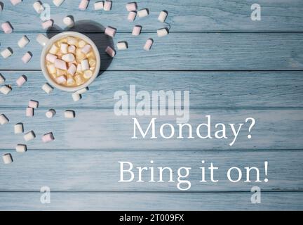MONDAY BRING IT ON concept text Female hands holding card with white ...