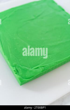 Green fudge with red hearts Stock Photo - Alamy