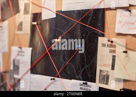 Background image of evidence board with pictures of criminals in ...