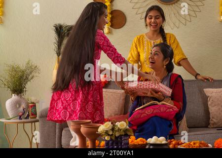 Portrait of Bengali family sitting together in the dining room Stock ...