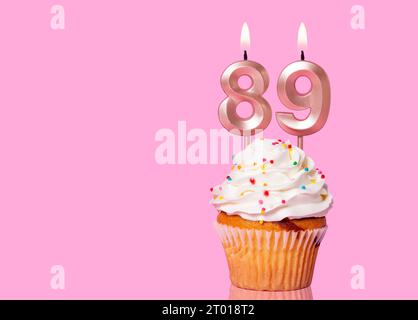 Birthday Cake With Candle Number 89 - On Green Background Stock Photo ...