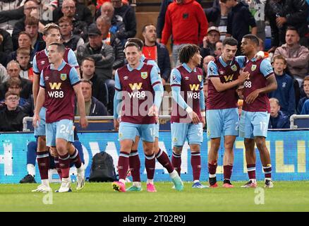 Burnley's Lyle Foster (right) celebrates with team-mate Josh Laurent ...