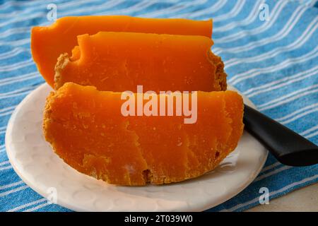 Pieces of native French aged cheese Mimolette, produced in Lille with ...