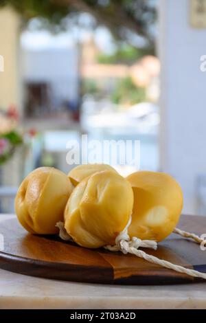 Italian semi hard handmade smoked scamorza cheese, from cow milk from ...