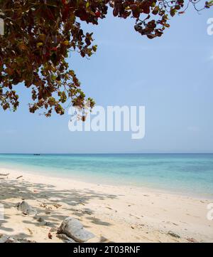 A beautiful shot of a seascape taken from in between two cliffs under ...