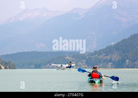 Kayak and seaplane on Green Lake, Whistler Stock Photo - Alamy