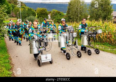 Trumpeters dressed in traditional costumes proudly take part in the ...