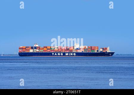 A Yang Ming container ship is loaded at the Maher Terminals container ...