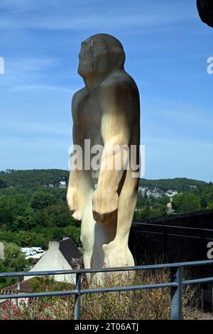 The statue of Cro Magnon Man looks out over the Dordogne river and ...