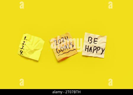Sticky notes with different goals for 2024 on yellow background Stock ...