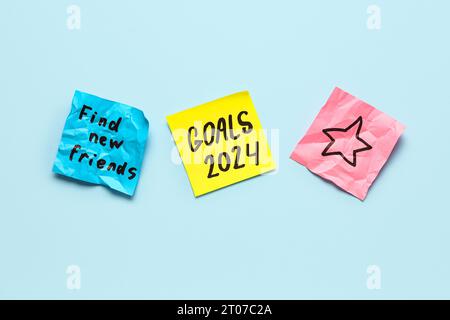 Sticky notes with different goals for 2024 on blue background Stock ...