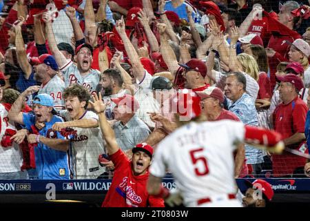 Bryson Stott #5 of the Philadelphia Phillies runs up the line during a ...