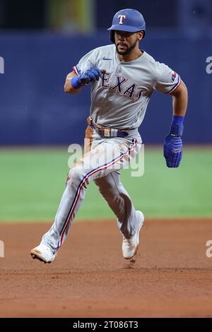 Texas Rangers' Josh Jung rounds first base after hitting a two-run home ...