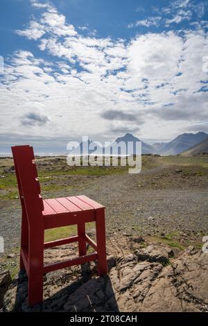 The Red Chair in Iceland on a Summer Day Stock Photo - Alamy