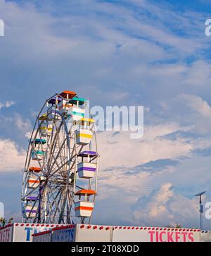 Colorful ferris wheel at a local county fair Stock Photo - Alamy