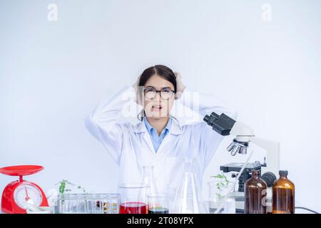 Female scientist laboratory confused and wondering about question Stock ...