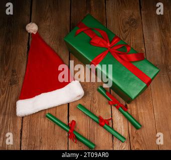 santa hat and letter with pencil. New Year or Christmas wish list ...