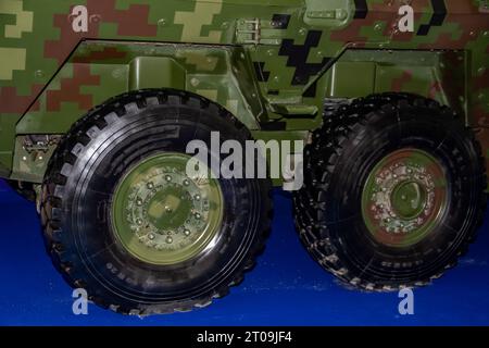 Armored combat vehicle painted in camouflage colors, armed with lethal ...