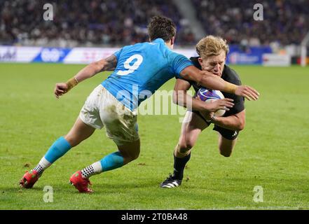 New Zealand's Damian McKenzie scores their side's third try during the ...