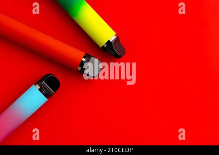 A set of colorful disposable electronic cigarettes of different shapes ...