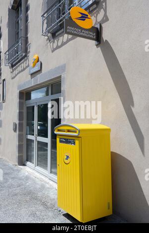 French Postal Agency Sign With Yellow and Blue Logo on Building Wall ...