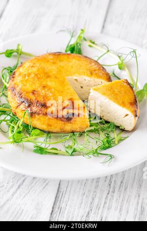 wheel of fresh curd cheese Stock Photo - Alamy