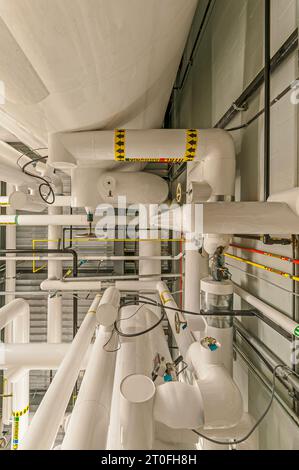 Vertical receiver tank, machinery, and piping in the ammonia-cycle ...