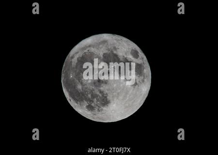 A mesmerizing full moon illuminates the night sky, casting its ethereal ...