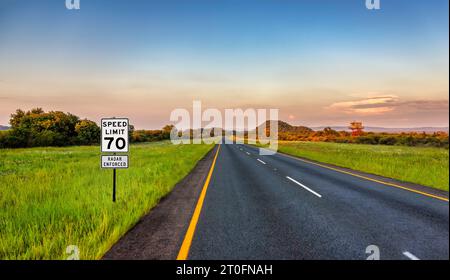 Sign of speed limit and radar enforced Stock Photo - Alamy