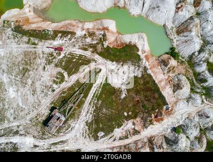 Rows of chalk piles machinery and ponds at mining quarry Stock Photo ...