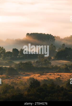 A scenic view of a mountain with the sunlight hitting on the peak Stock ...
