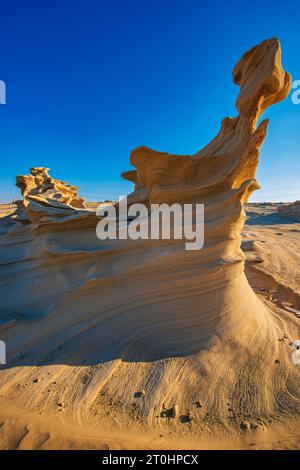 Desert eroded rock pattern with clear sky during the hot sun. Desert ...