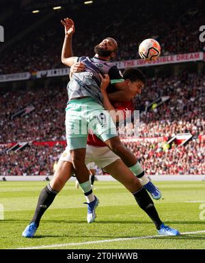 Manchester United's Bryan Mbeumo (left) and Nottingham Forest's Murillo ...