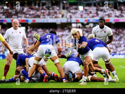 Samoa's Jonathan Taumateine passes the ball during the Rugby World Cup ...