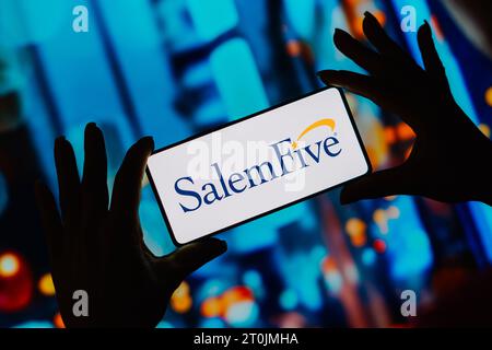 In this photo illustration, the Salem Five Bank logo is displayed on a ...