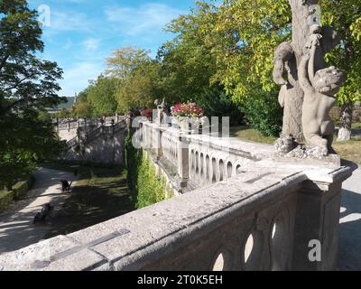 Baroque balustrade with sandstone statues in the court garden in front ...