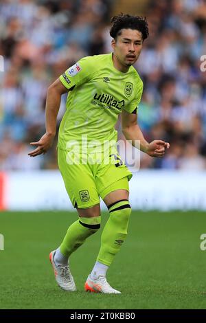 Yuta Nakayama #33 of Huddersfield Town warms up before the game during ...
