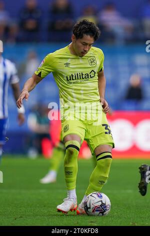 Yuta Nakayama #33 of Huddersfield Town warms up before the game during ...