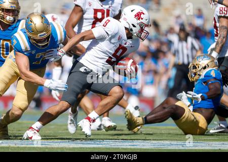 Washington State wide receiver Isaiah Hamilton runs a route during the ...